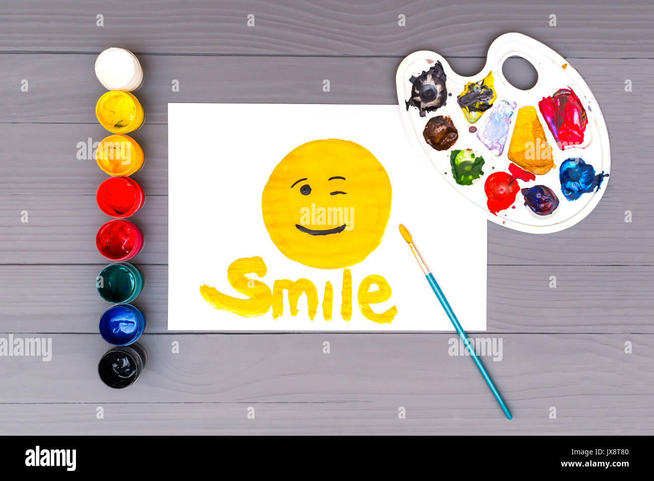 Painted smile on sheet Stock Photo - Alamy