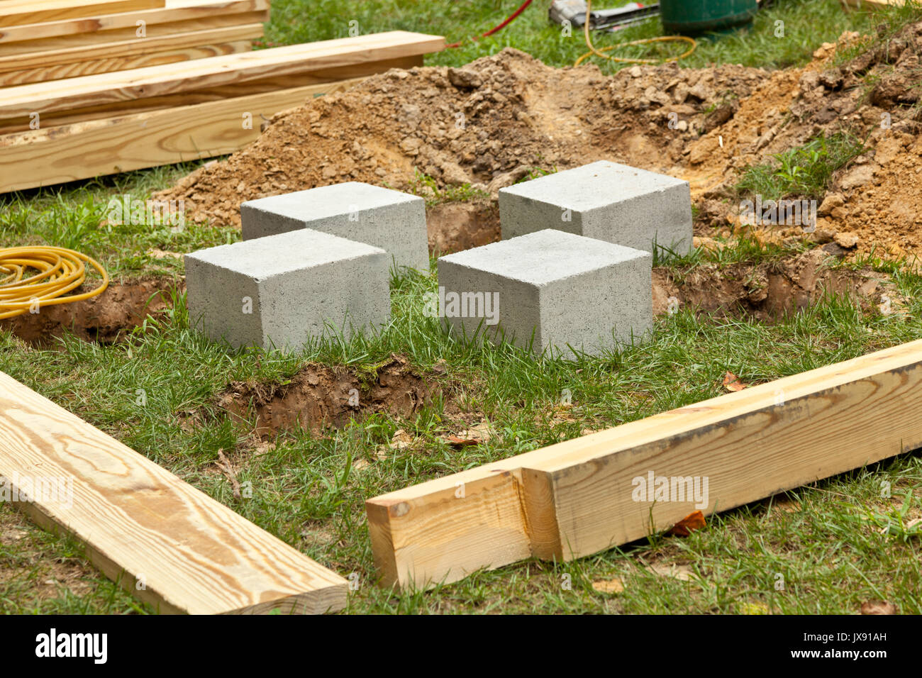 cement blocks used for wood beam footings Stock Photo - Alamy