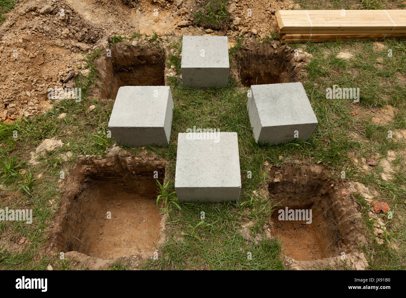 cement blocks used for wood beam footings Stock Photo - Alamy