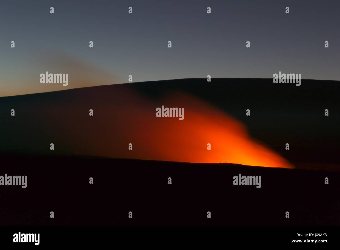Red hot lava, steam, smoke and fire from the Kilauea volcano at the rim ...