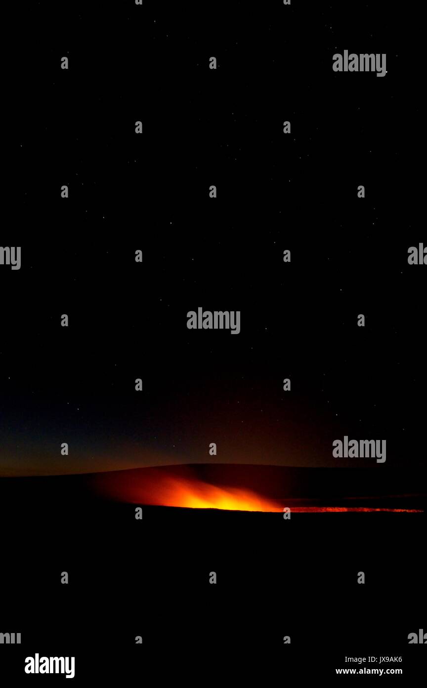 Red hot lava, steam, smoke and fire from the Kilauea volcano at the rim ...