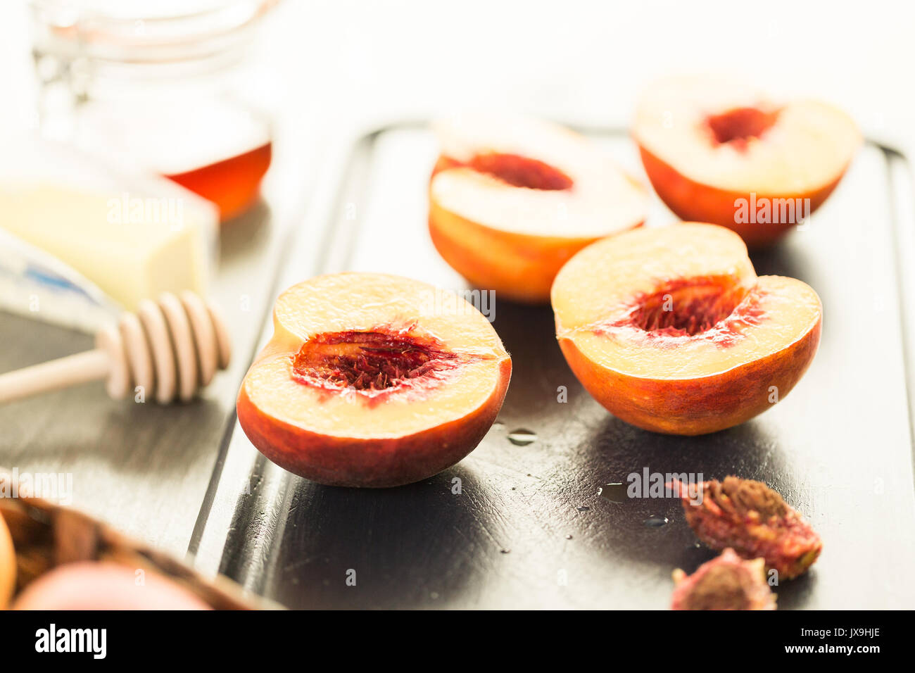 Cutting peaches in half making hi-res stock photography and images - Alamy