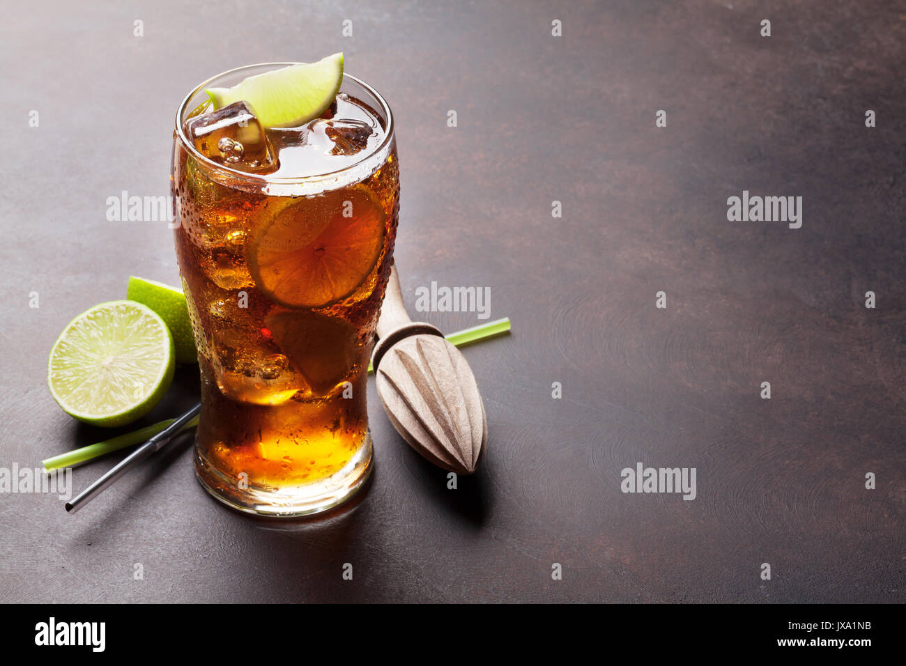 Cuba libre cocktail glass. With copy space Stock Photo - Alamy