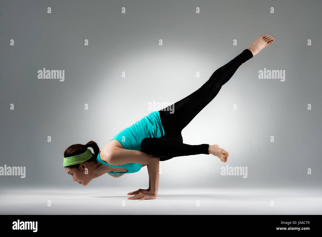 professional yoga dancer display powerful force and perform latest yoga ...