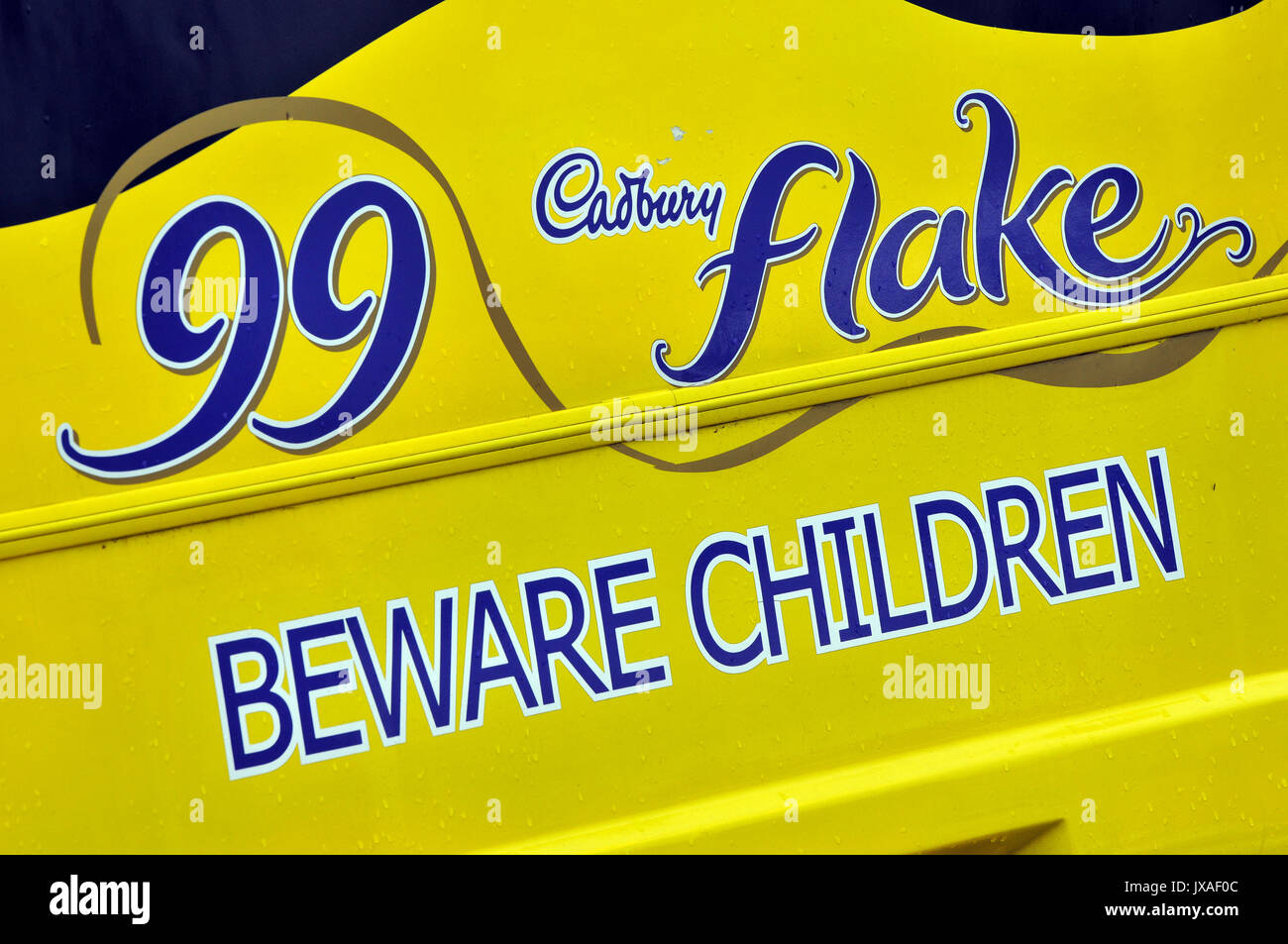 a sign saying beware of children written on the side of an ice cream ...