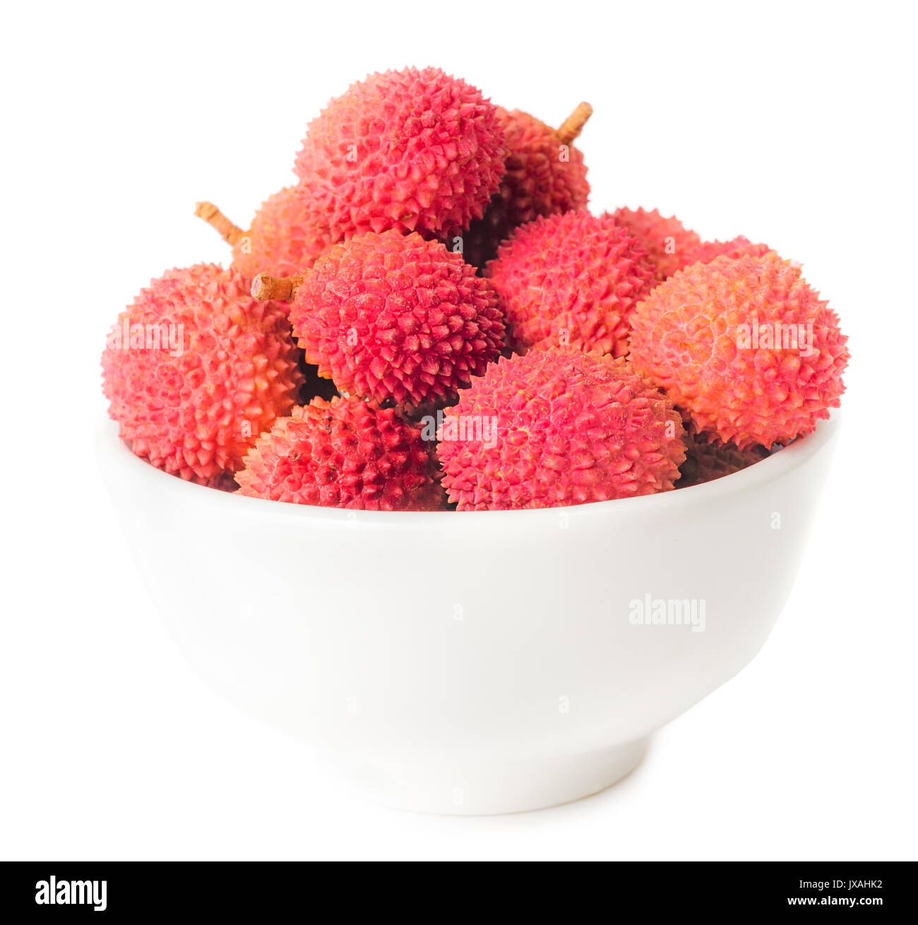 Sweet lychees fruits in bowl isolated on white background Stock Photo ...