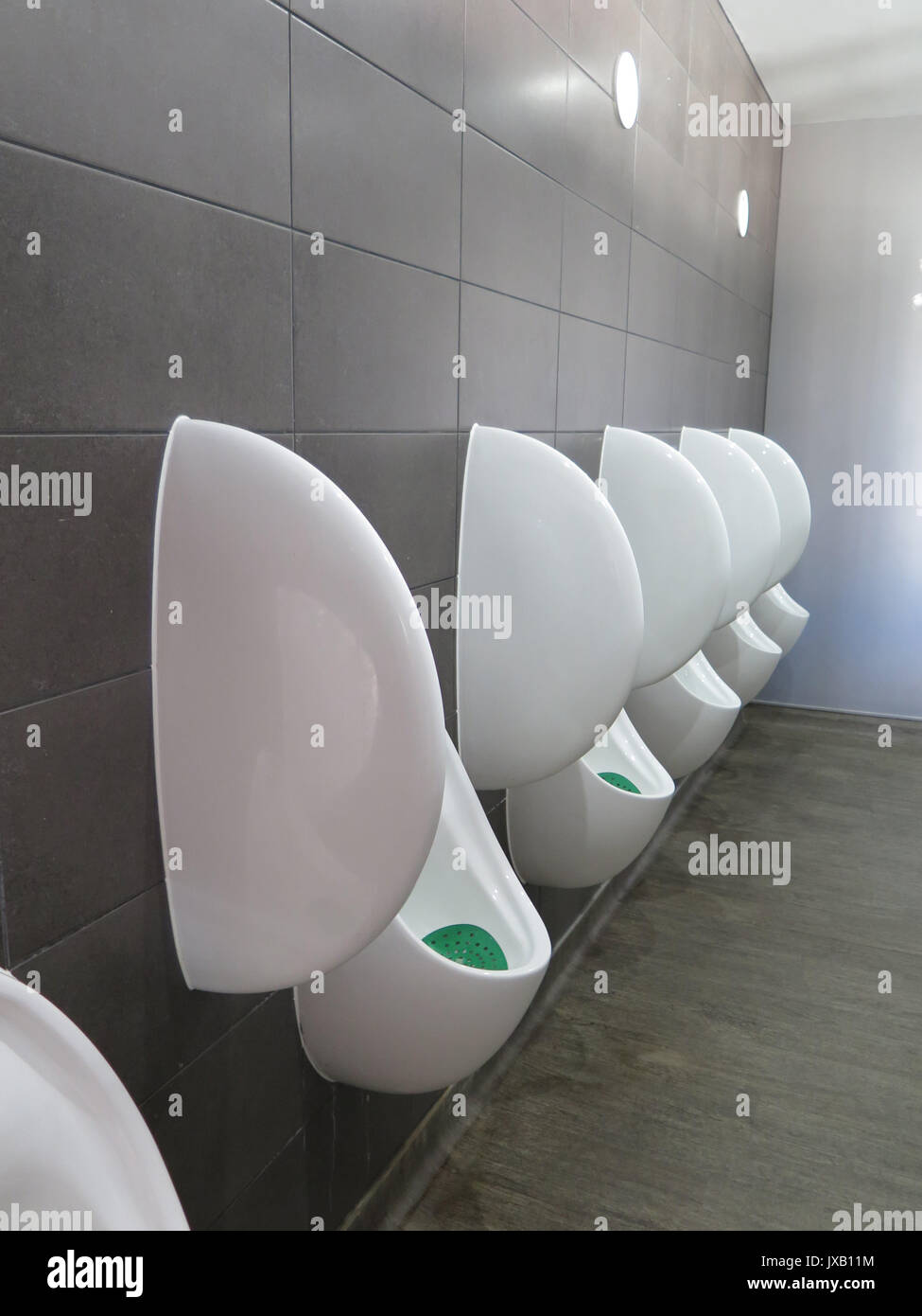Mens room urinals hi-res stock photography and images - Alamy