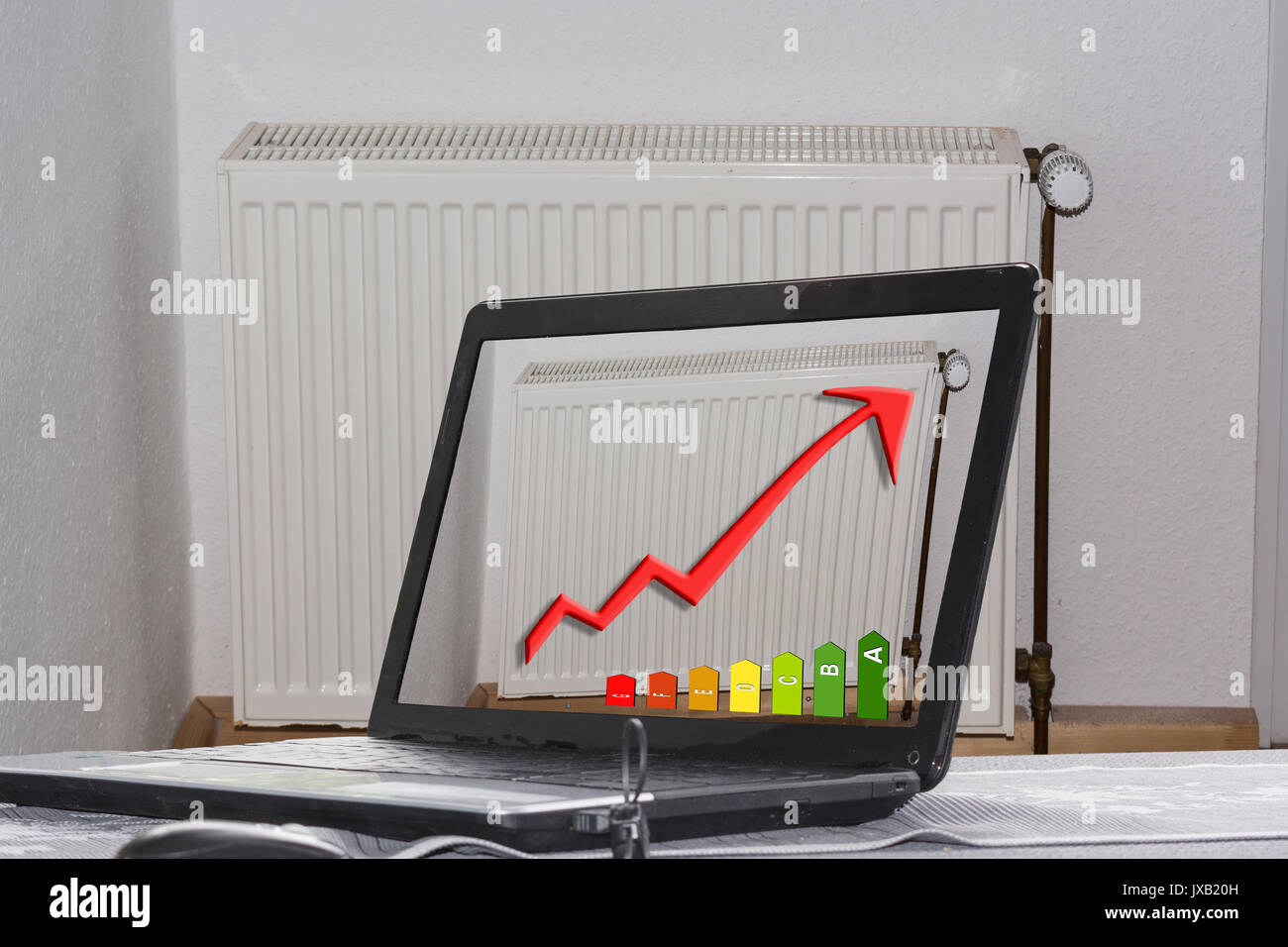 Laptop with image of a radiator and diagram on the monitor. Concept ...