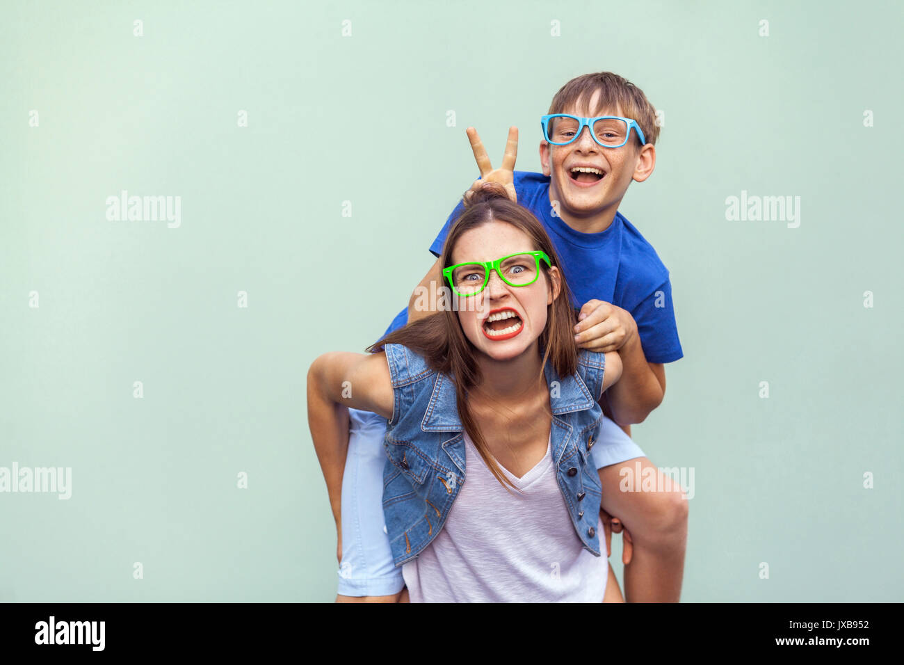 Brother sister face face hi-res stock photography and images - Alamy
