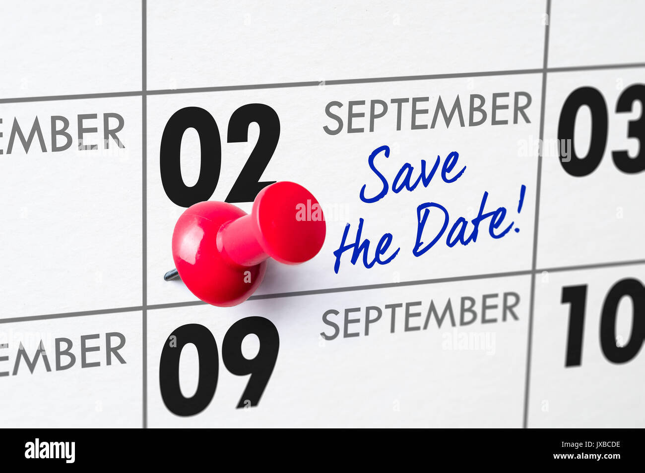 Wall calendar with a red pin - September 02 Stock Photo - Alamy