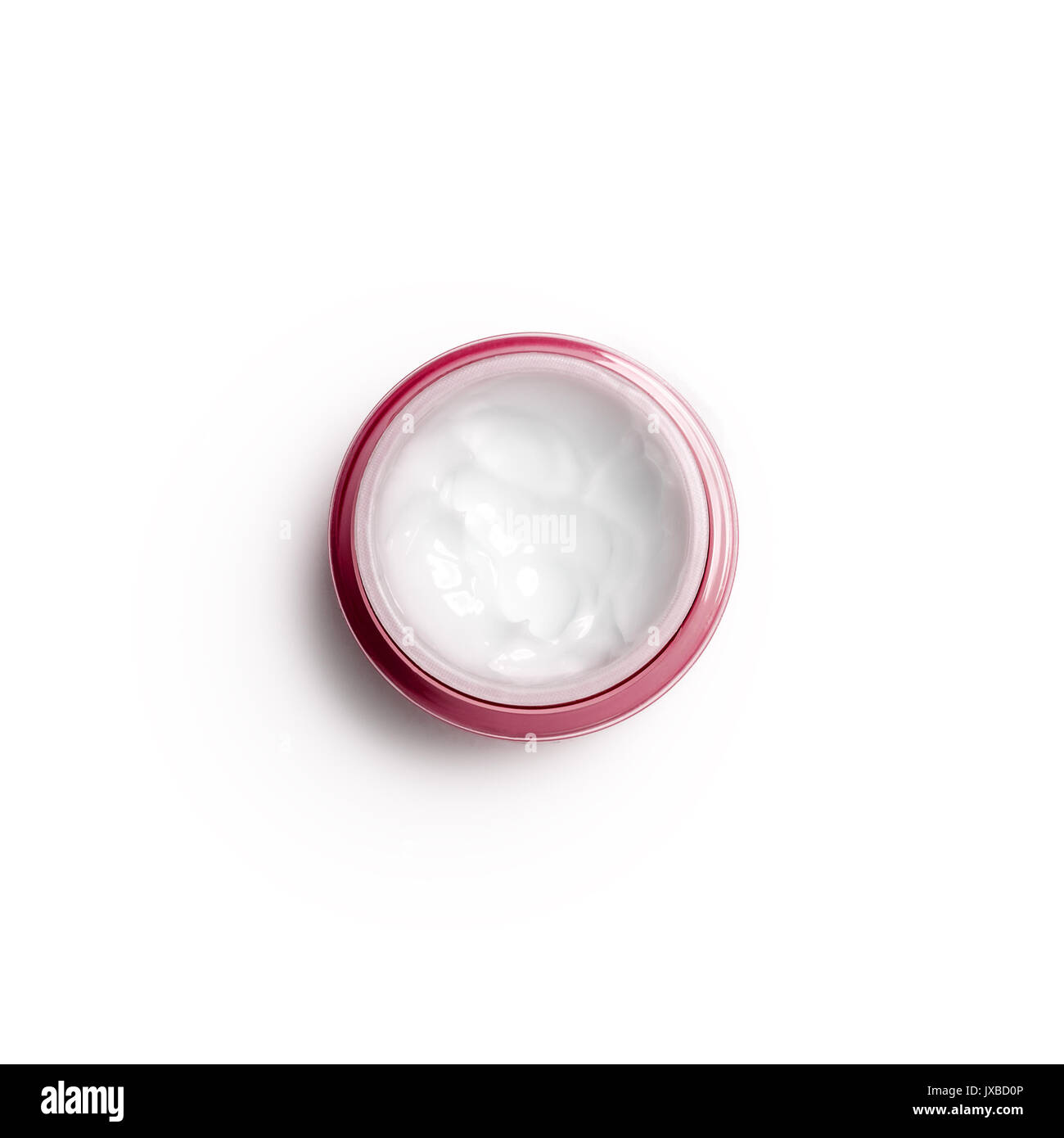 Container of moisturizing face cream on white background. Top view ...