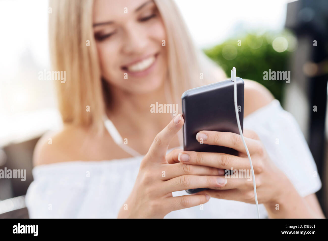Modern smartphone being used for listening to music Stock Photo - Alamy