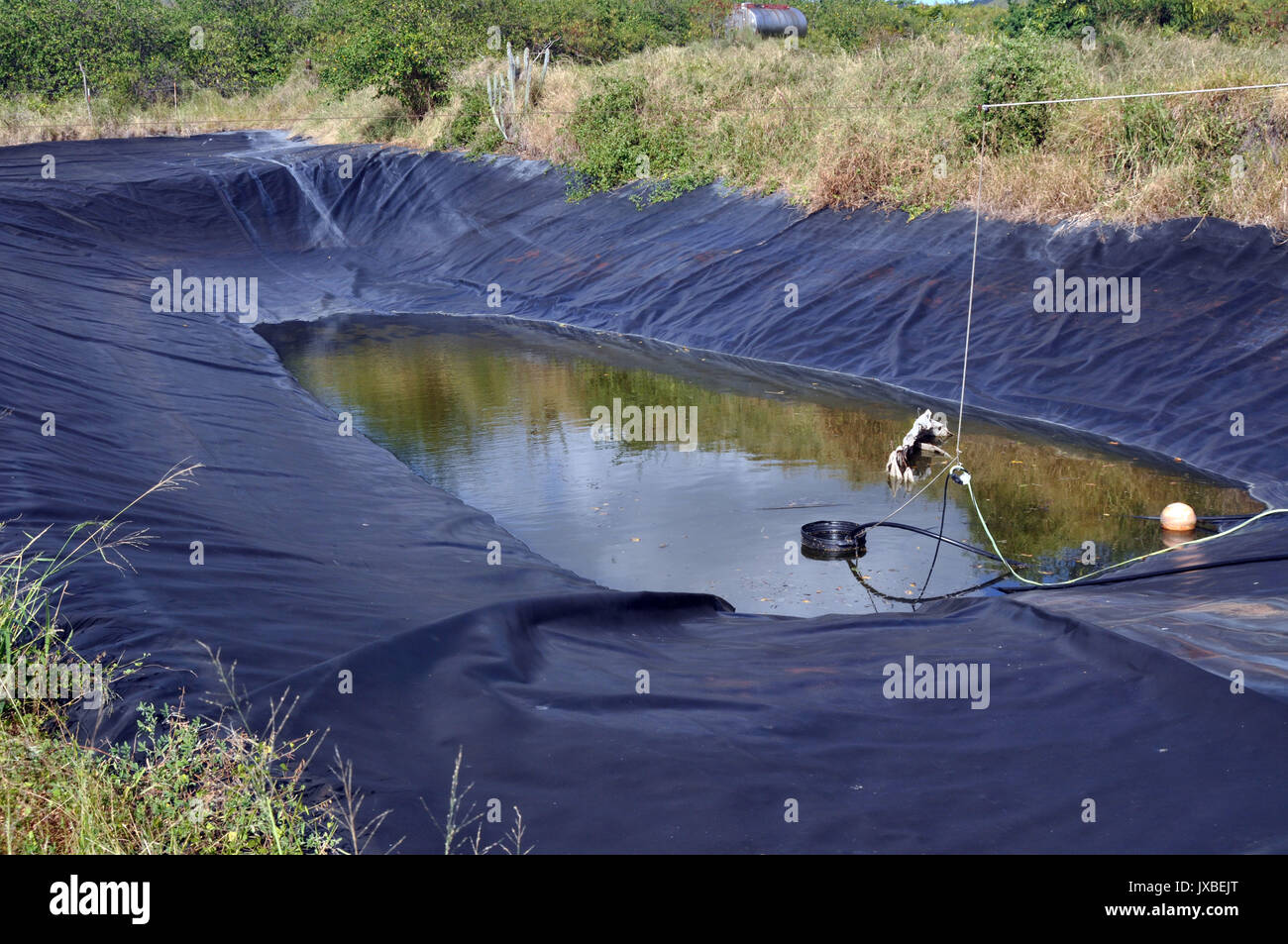 Pond for solar power water collection system in the islands Stock Photo ...