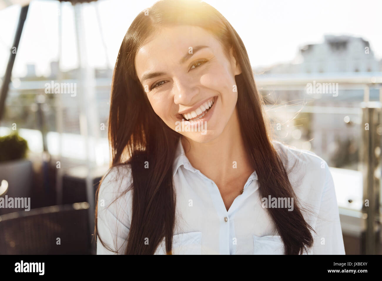 Joyful elated woman being in a great mood Stock Photo - Alamy