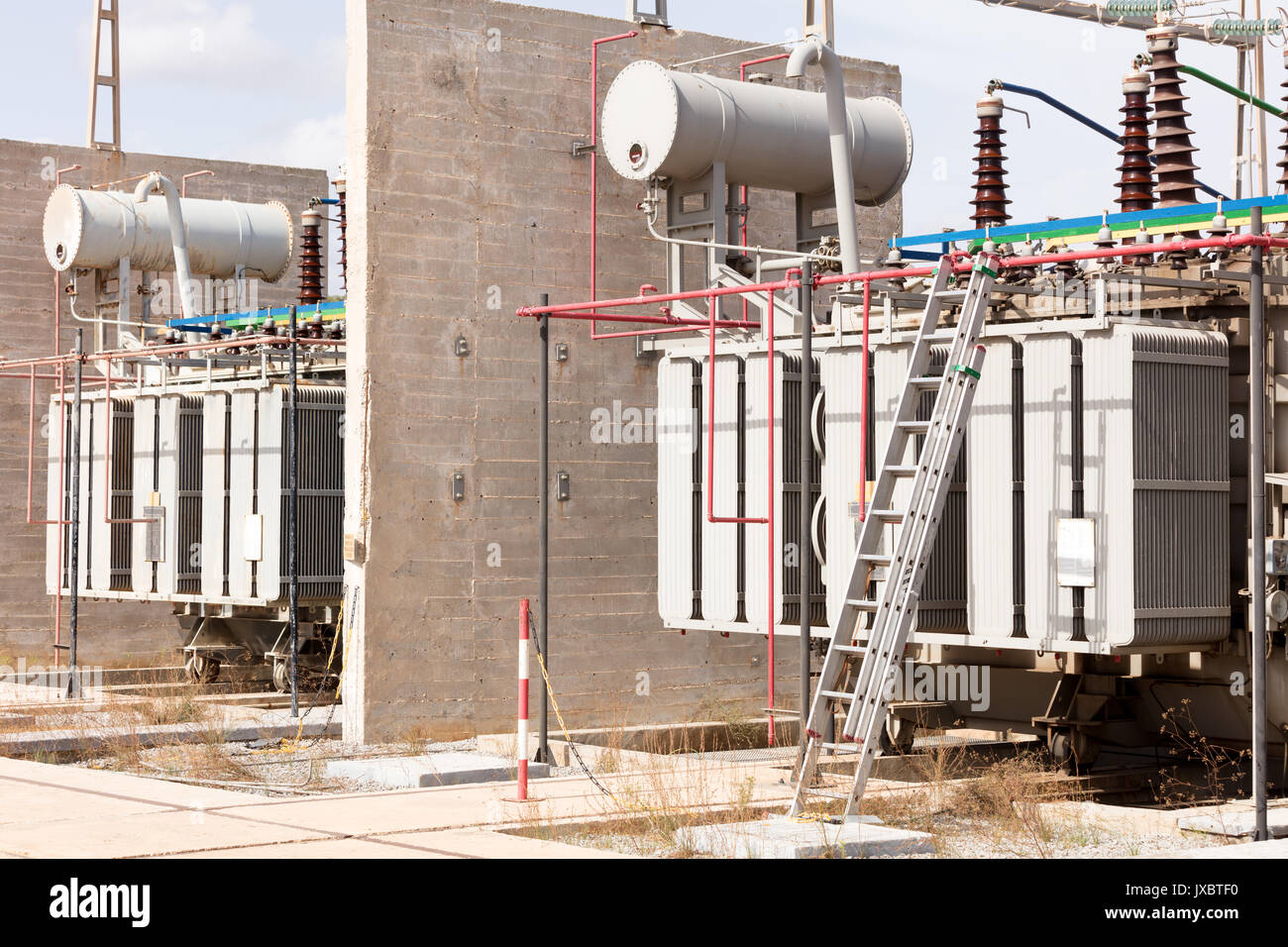group of transformers in high voltage installation Stock Photo - Alamy