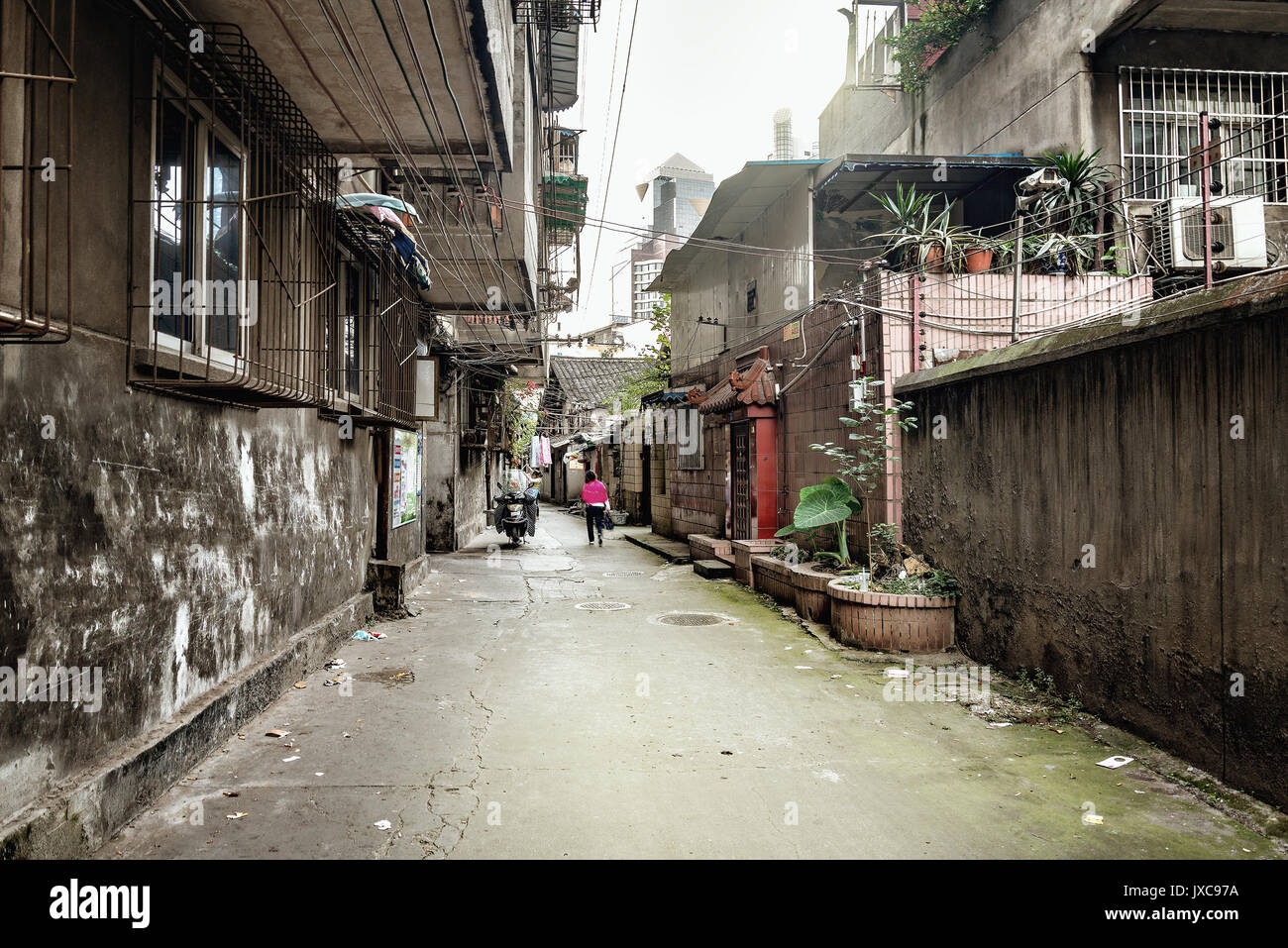 Poor street of Chengdu city by the business district. Sichuan province ...