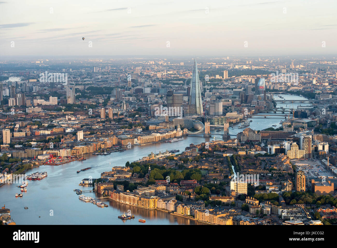 An aerial view of central London at sunrise, including the River Thames ...