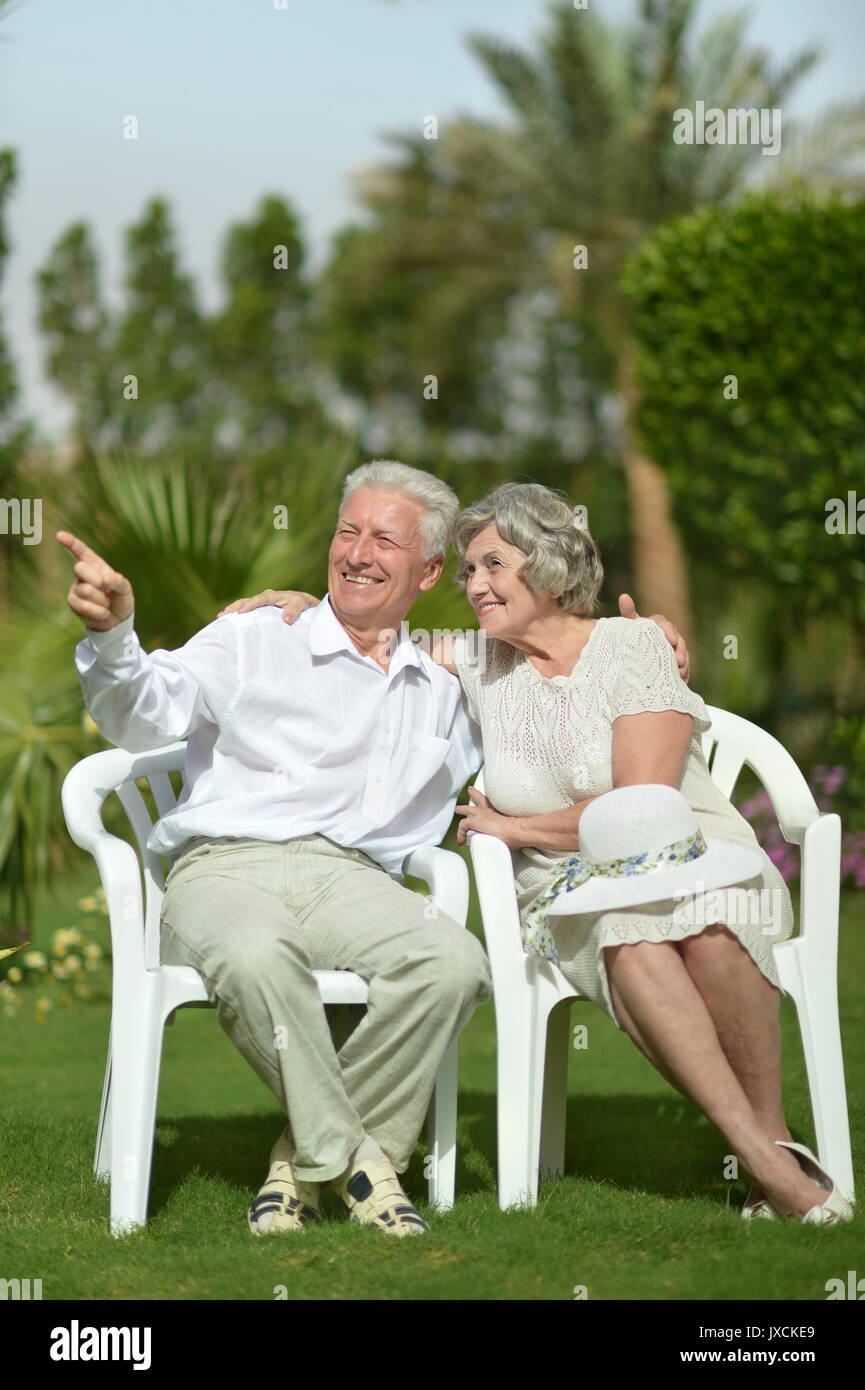 Couple sitting on chairs hi-res stock photography and images - Alamy
