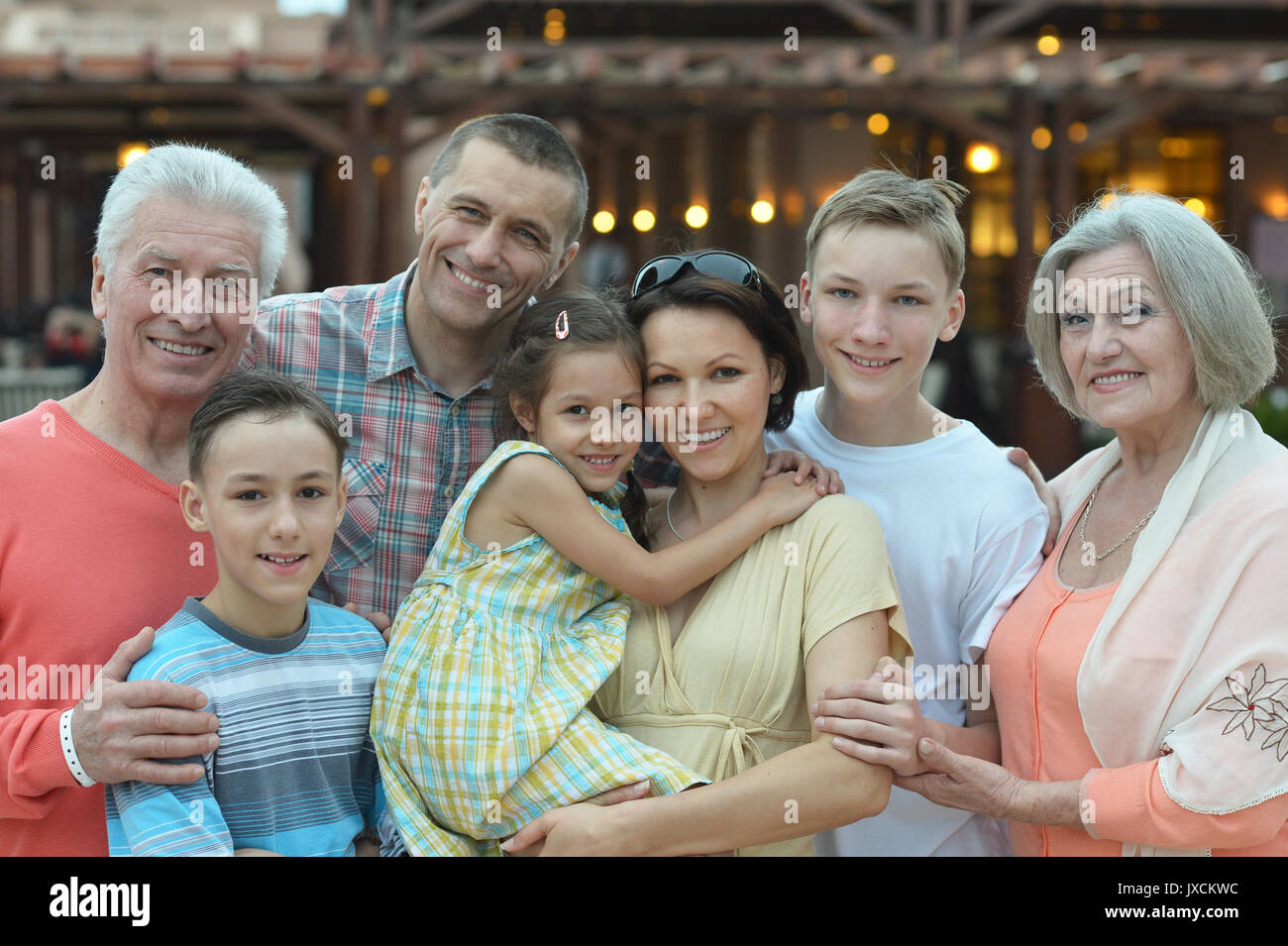 Big happy family standing together Stock Photo - Alamy