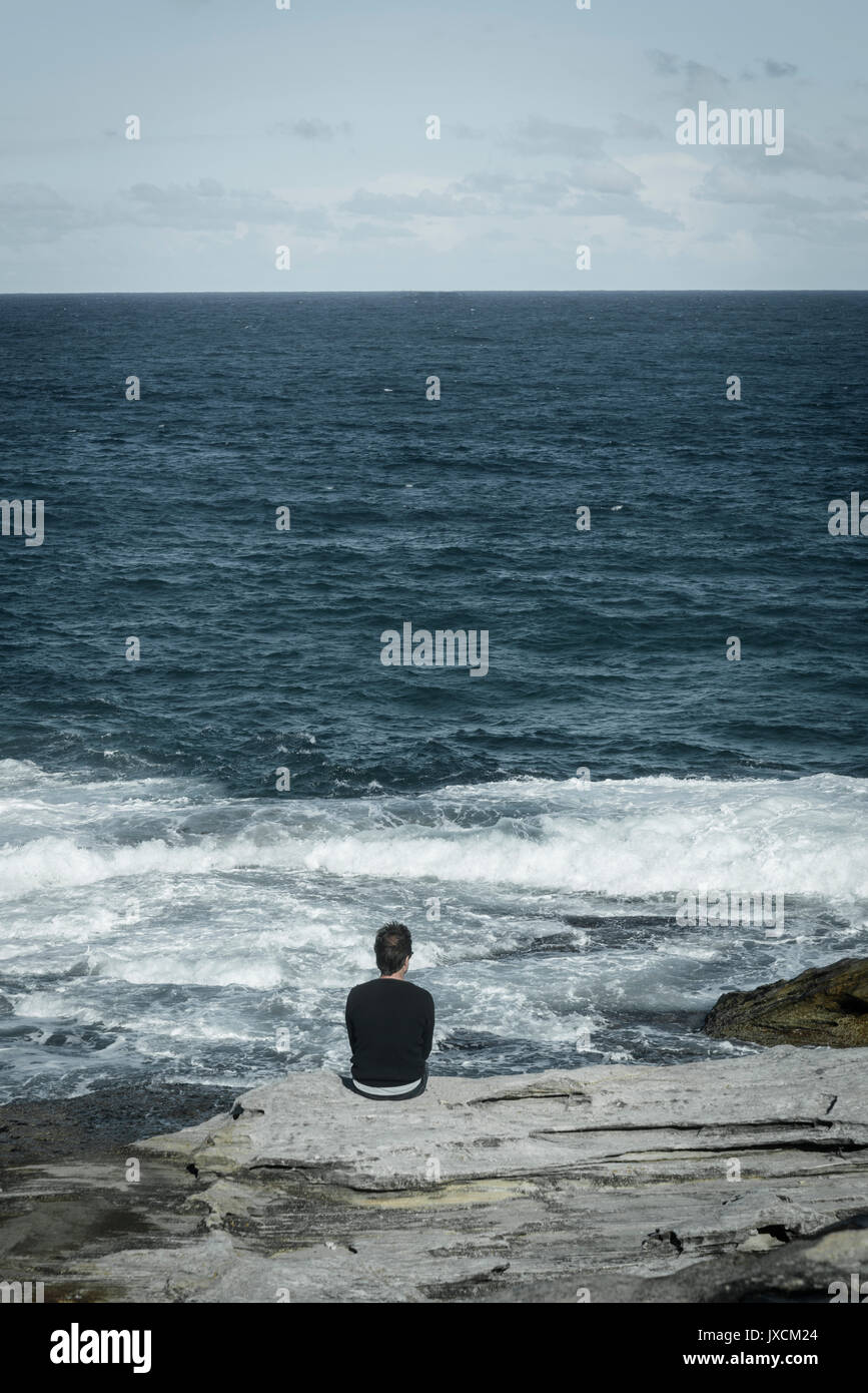 Man looking at sea, Sydney, NSW, Australia Stock Photo - Alamy