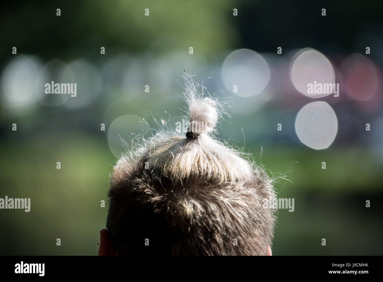 Hair messy top knot hi-res stock photography and images - Alamy