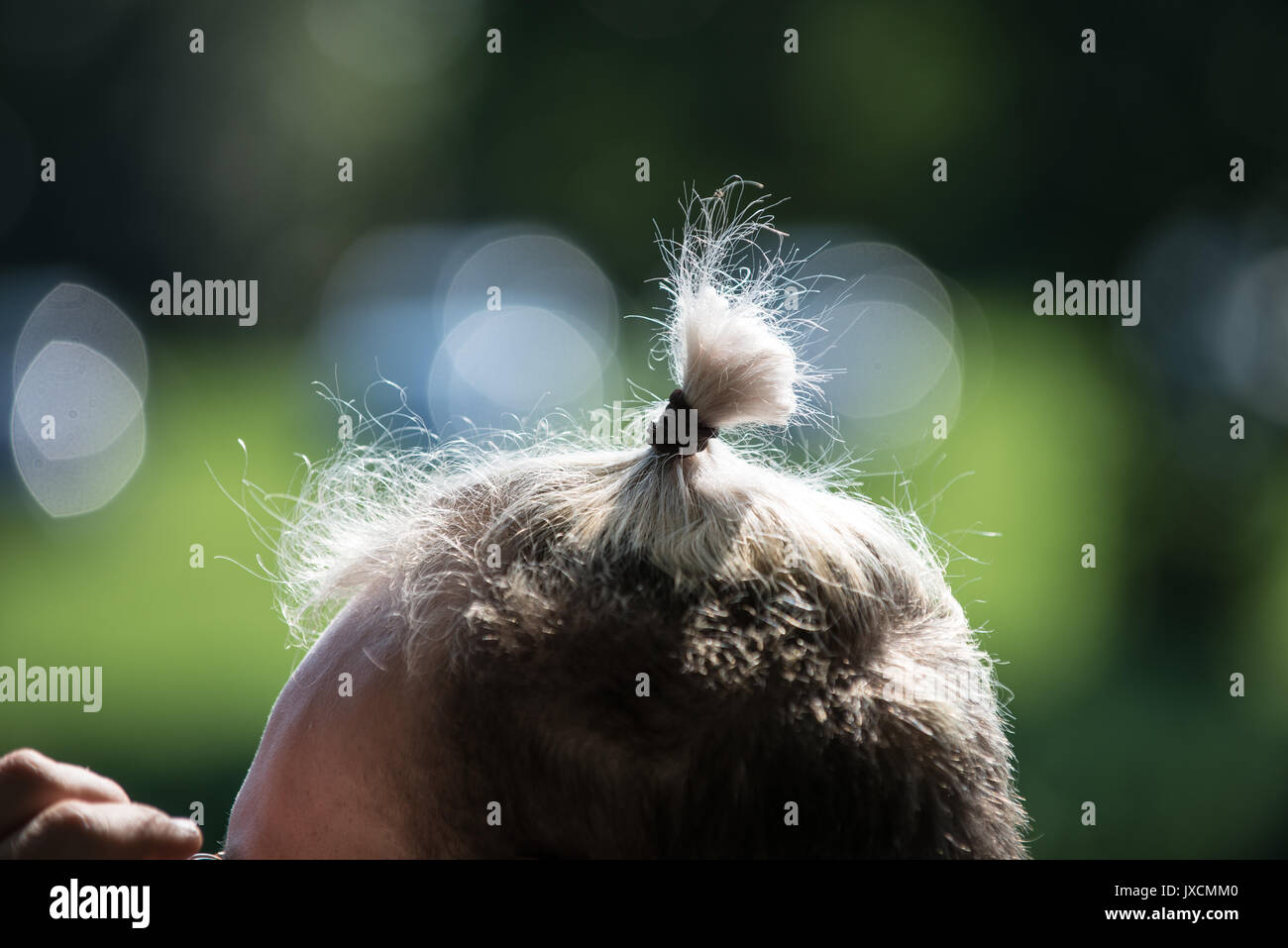 Top knot hi-res stock photography and images - Alamy