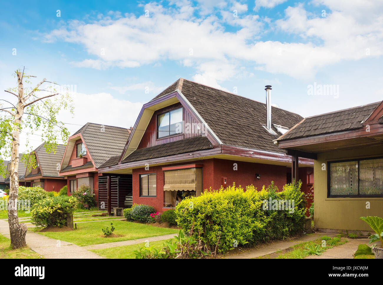 Typical chilean two-storey houses in Valdivia Stock Photo - Alamy