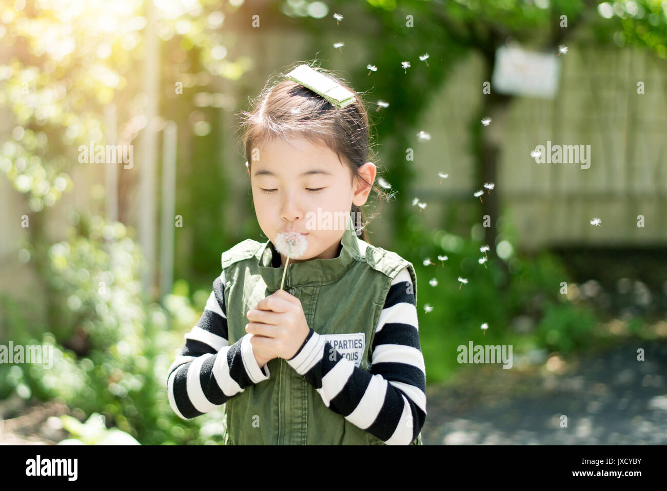 Child wind blowing in face hi-res stock photography and images - Alamy
