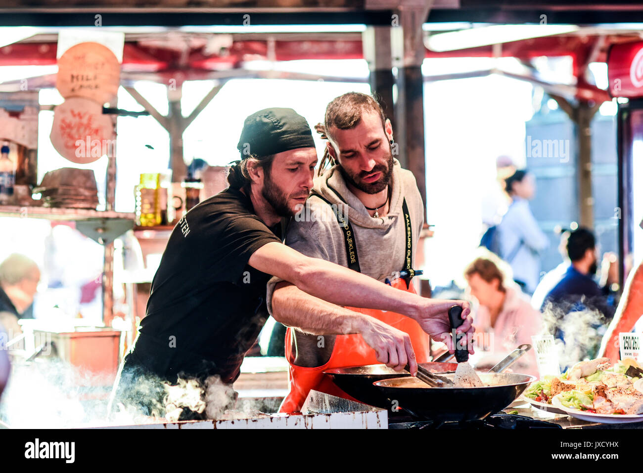 Bergen, Norway, 23 July 2017: Bergen Fishmarket, Chef cooks at the fish ...
