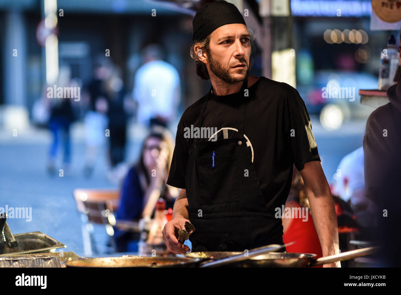 Bergen, Norway, 23 July 2017: Bergen Fishmarket, Chef cook at the fish ...