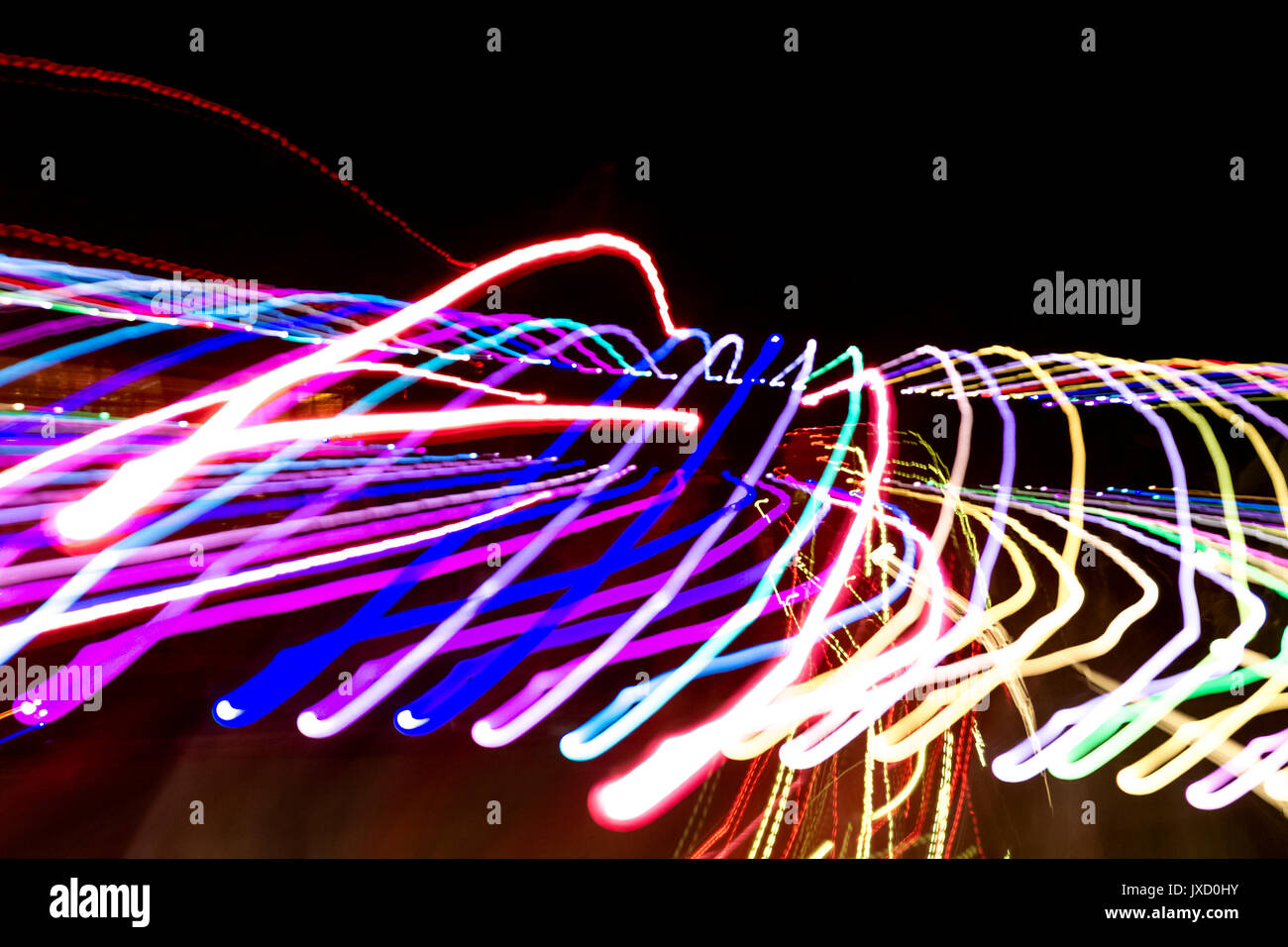 abstract background of traced lights in the dark Stock Photo - Alamy