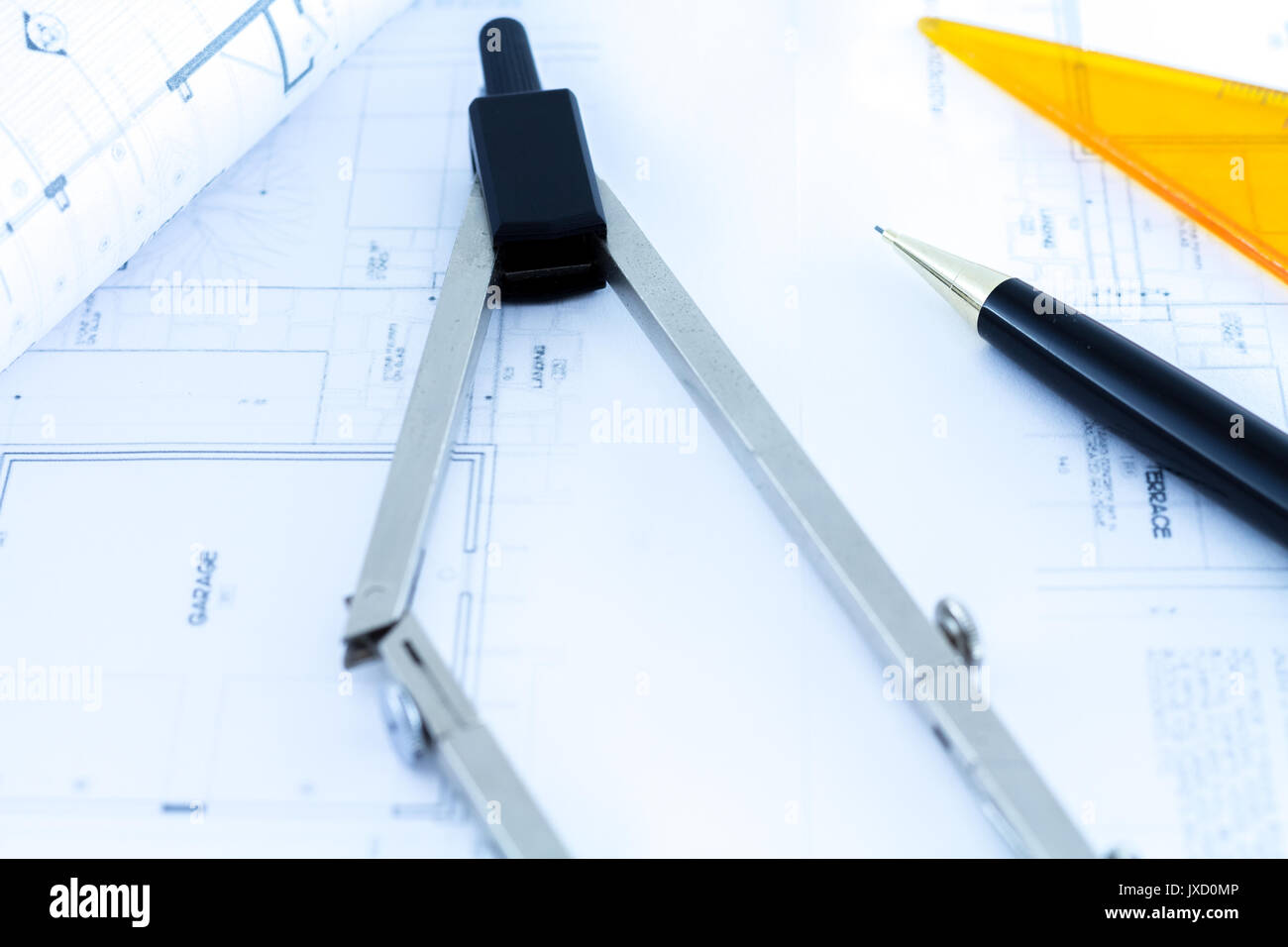 Architect construction plans workspace with tools Stock Photo - Alamy