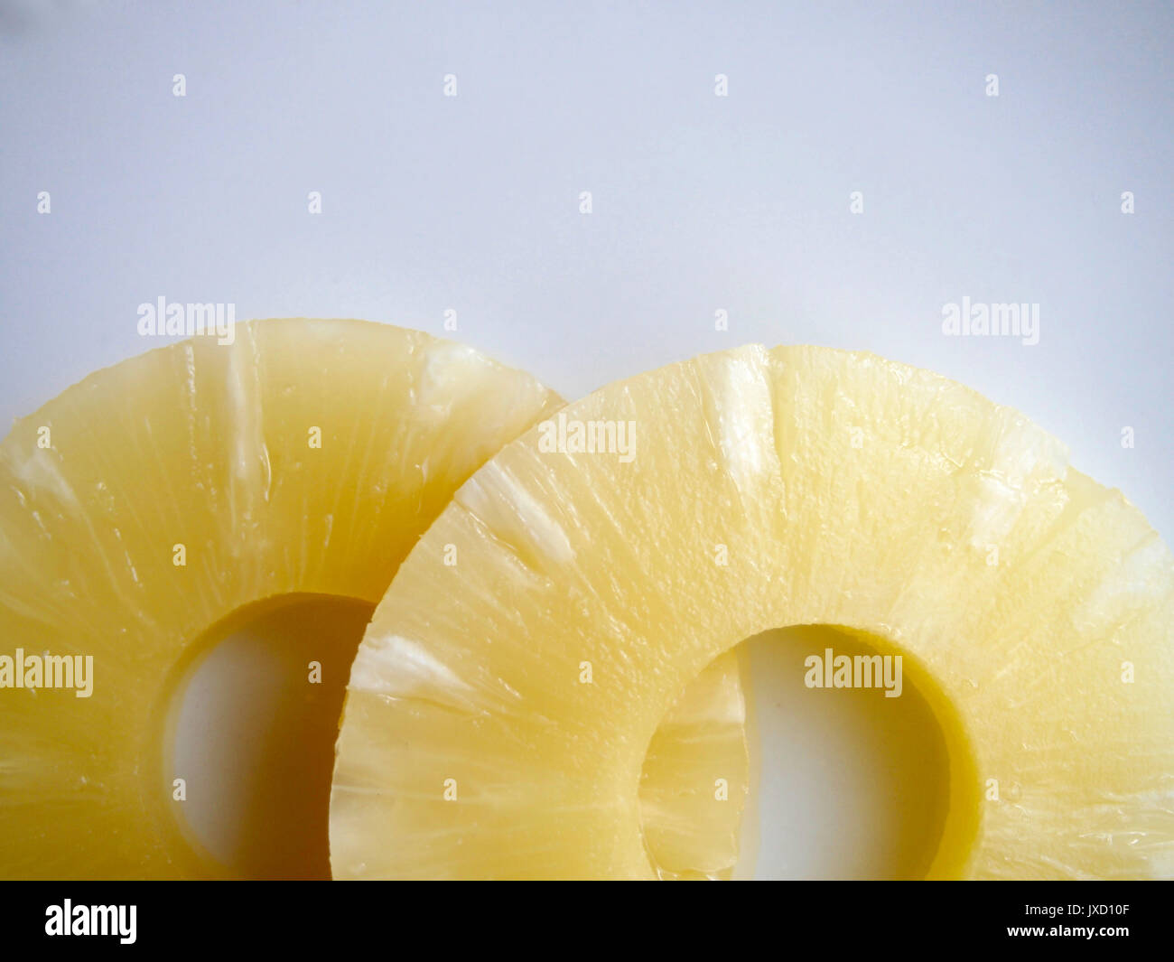 Sliced of pineapple on white background Stock Photo - Alamy