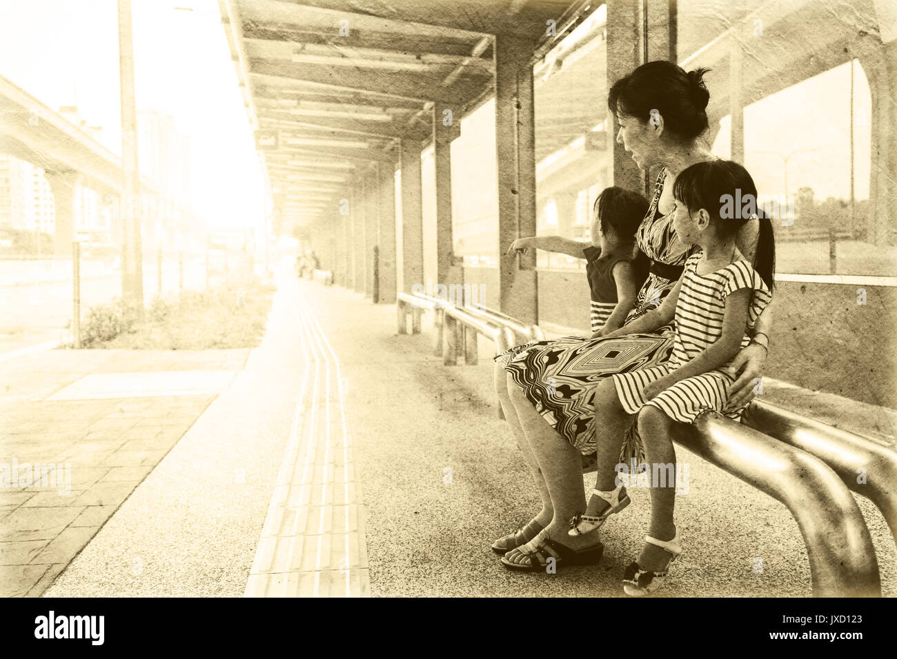 Chinese woman waiting bus stop hi-res stock photography and images - Alamy