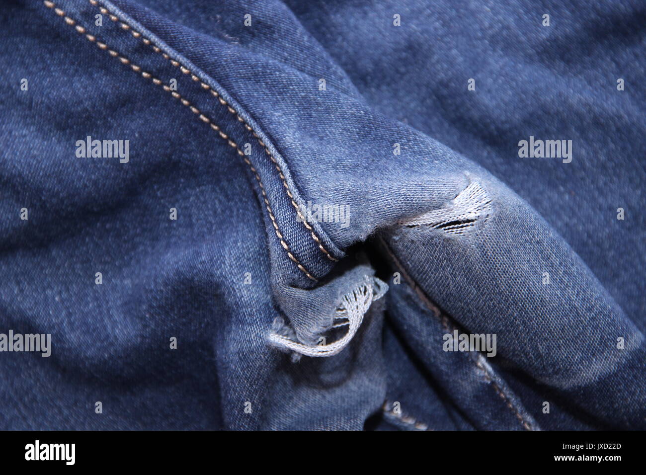 Torn jeans hi-res stock photography and images - Alamy