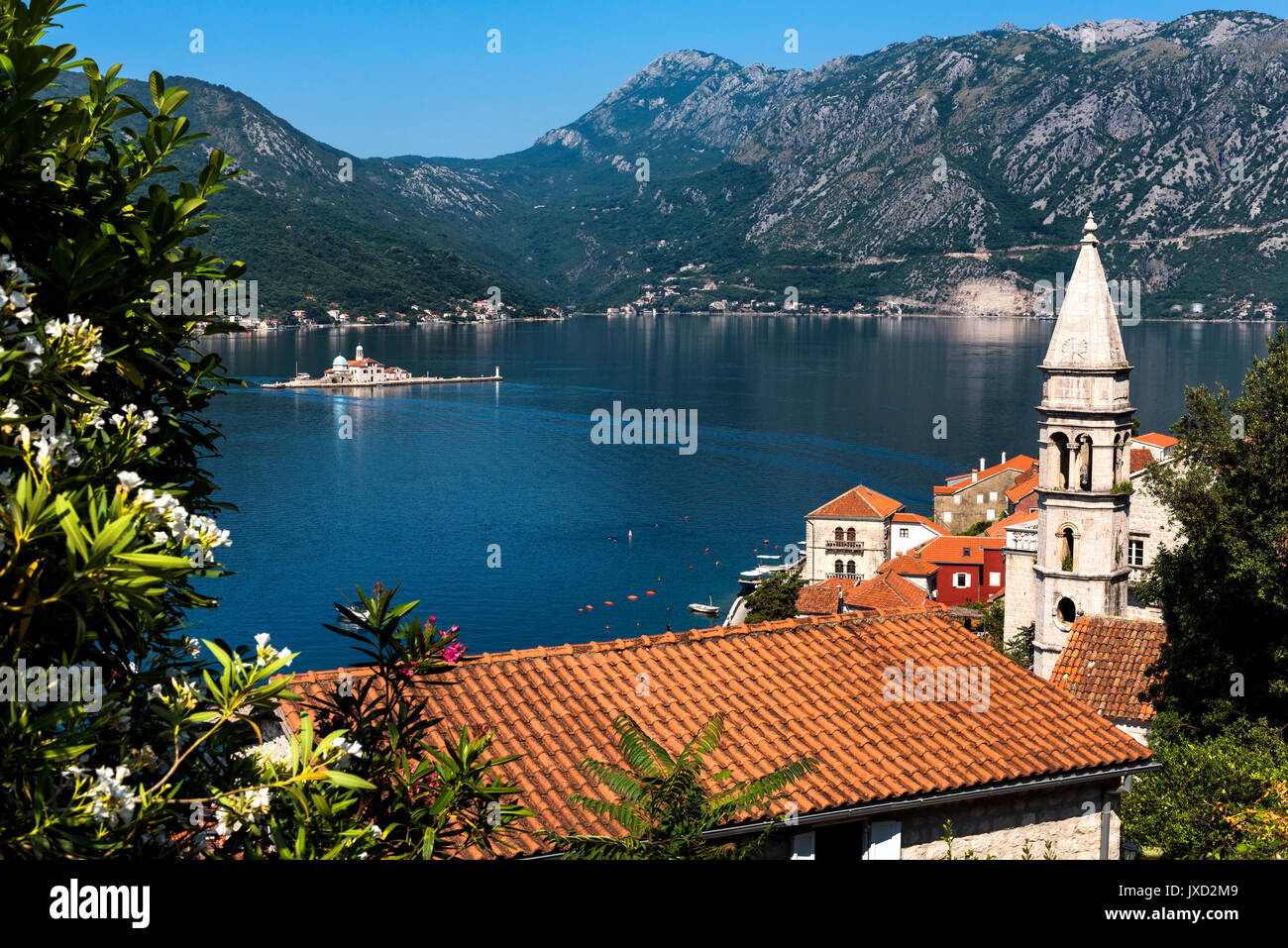 The bell tower of St Nicholas Church and the village of Perast in ...