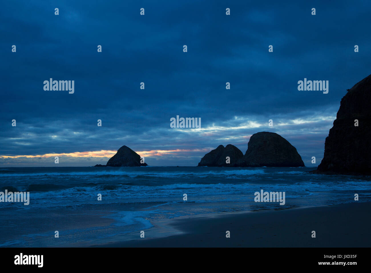 Three Arch Rocks dusk, Oceanside State Park, Oregon Stock Photo - Alamy