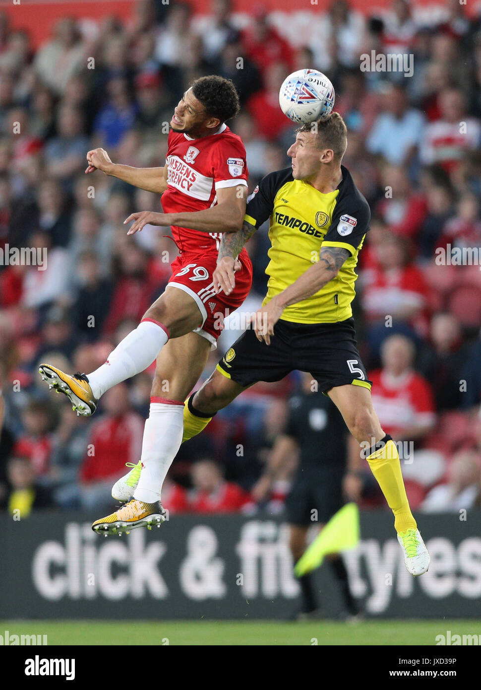 Middlesbrough's Rudy Gestede (left) and Burton Albion's Kyle McFadzean ...