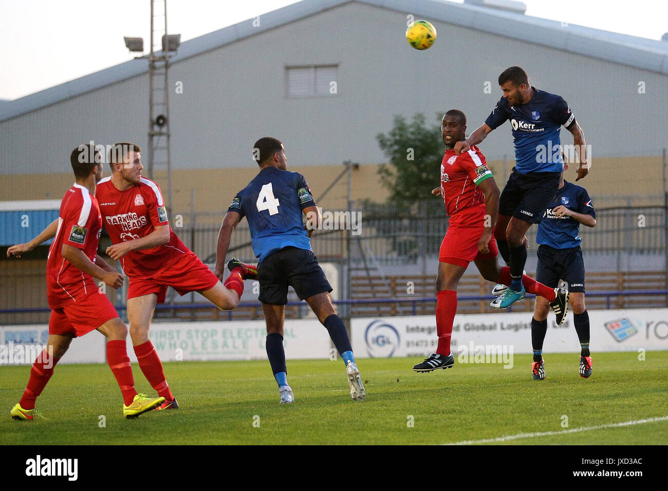 Ahmet Rifat of Wingate & Finchley heads clear from Curtis Ujah of ...