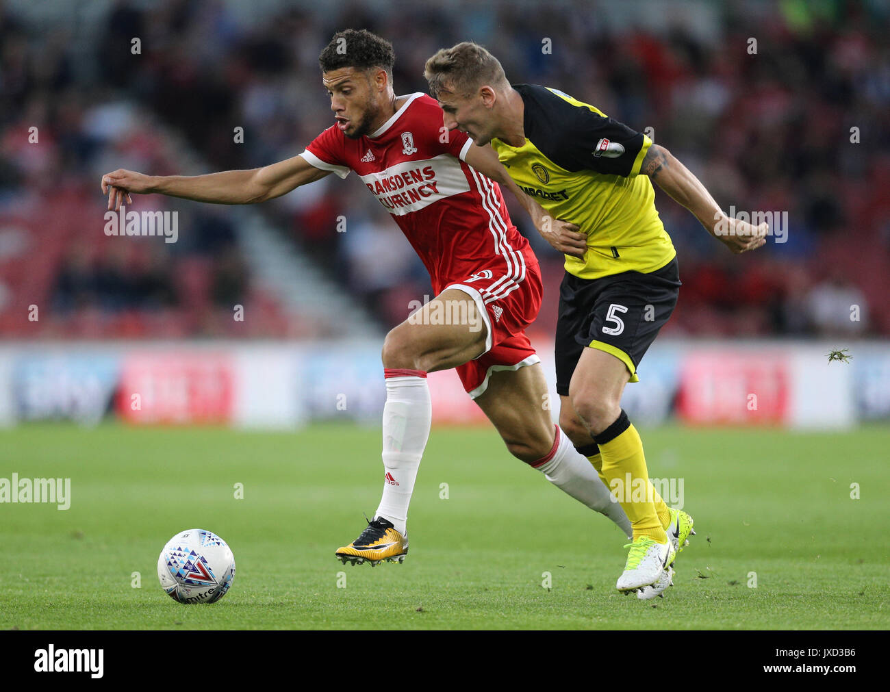 Middlesbrough's Rudy Gestede (left) and Burton Albion's Kyle McFadzean ...