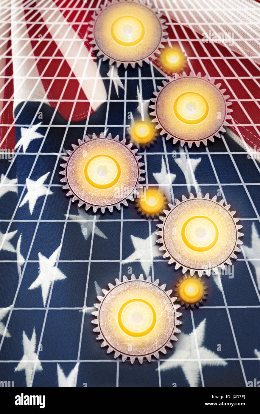 INTERLOCKING COG GEARS ON GRID OVER FLAG OF UNITED STATES OF AMERICA ...