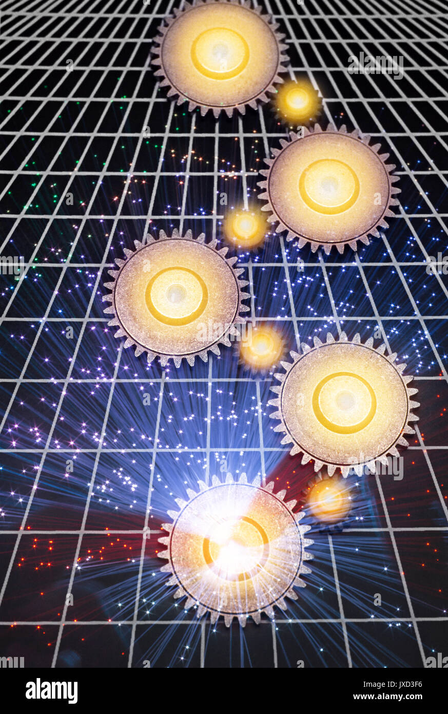 INTERLOCKING COG GEARS ON GRID OVER LIT TIPS OF FIBER OPTIC STRANDS ...