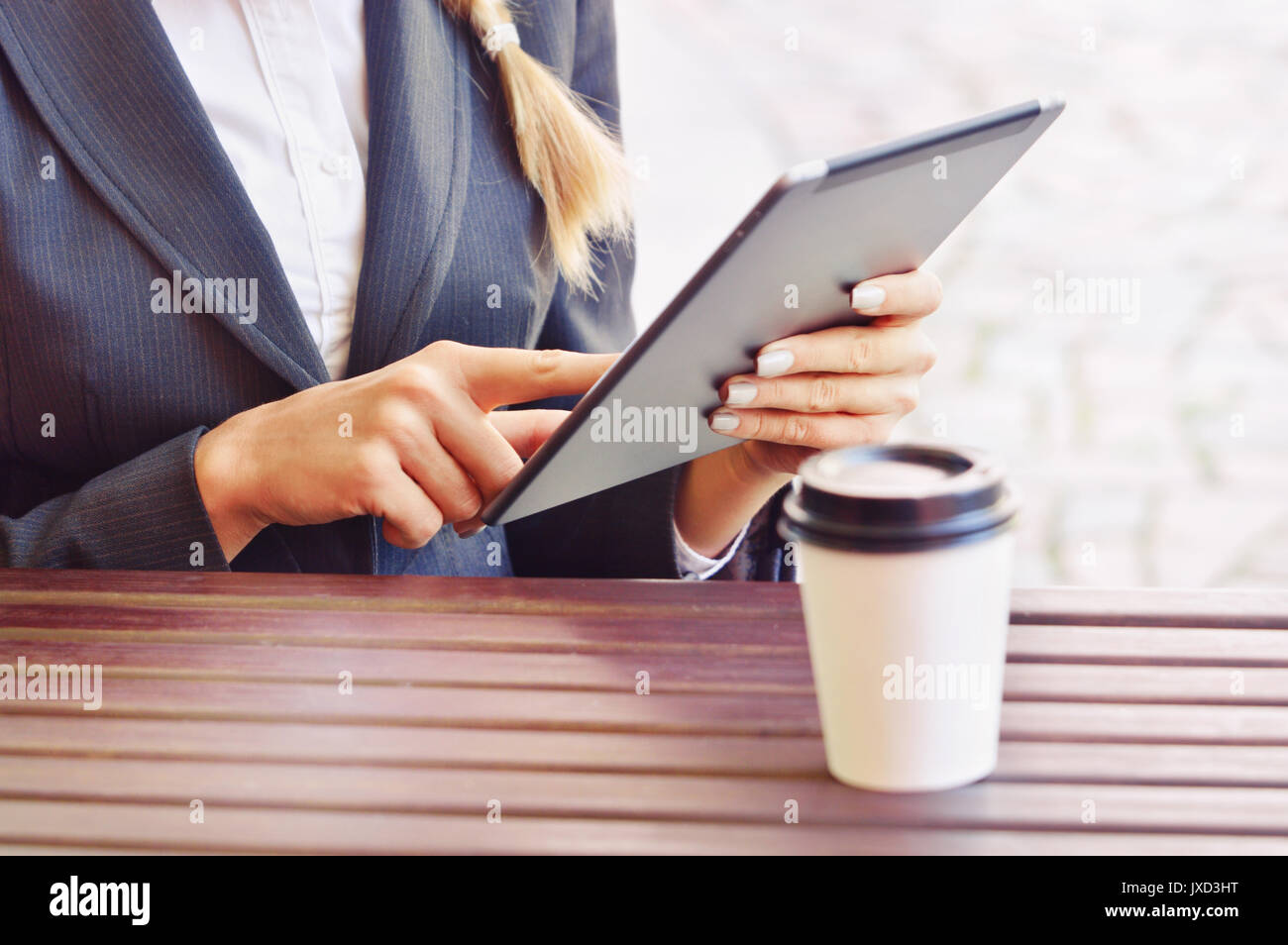 Closeup hands holding tablet in hi-res stock photography and images - Alamy