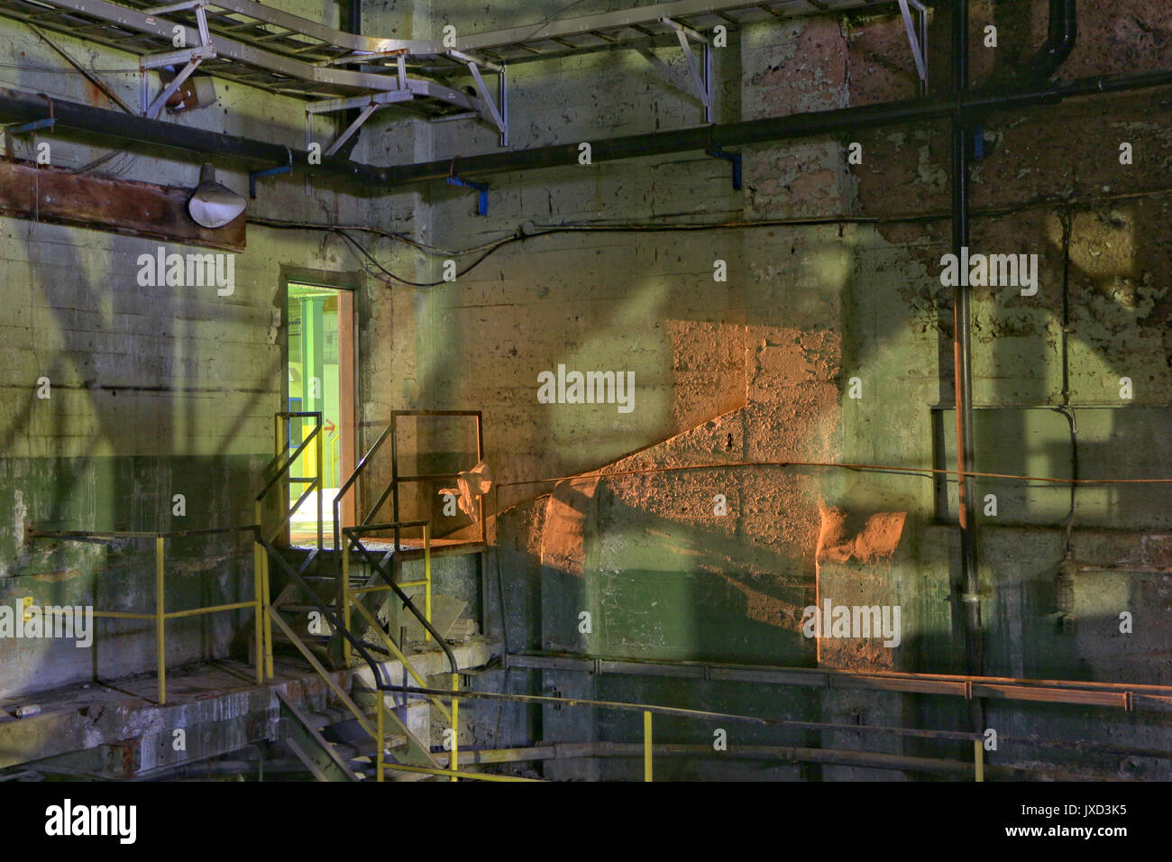 Multiple light sources play dramatically across walls of E B Eddy paper ...