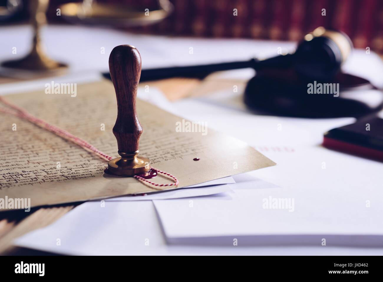 Metal wax notary public stamper on old document. Law office Stock Photo ...