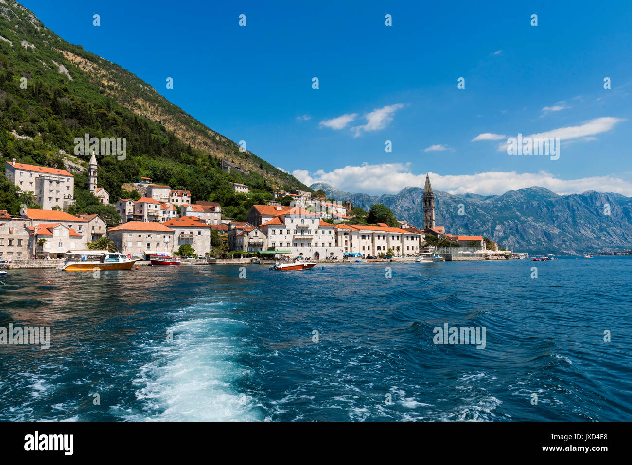 The bell tower of St Nicholas Church and the village of Perast in ...
