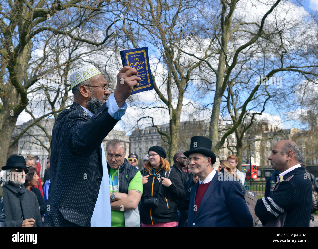 Muslim fundamentalist preacher holding a Koran. Speakers Corner, Hyde ...