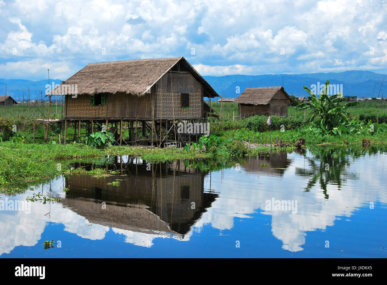Traditional houses in a floating village on the Inle lake, Myanmar ...