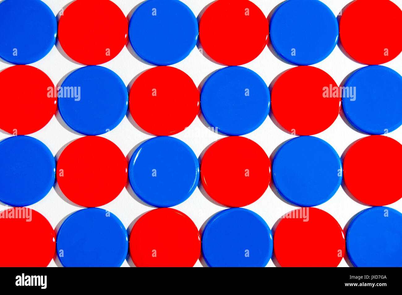 Colored plastic counters in srudio setting Stock Photo - Alamy