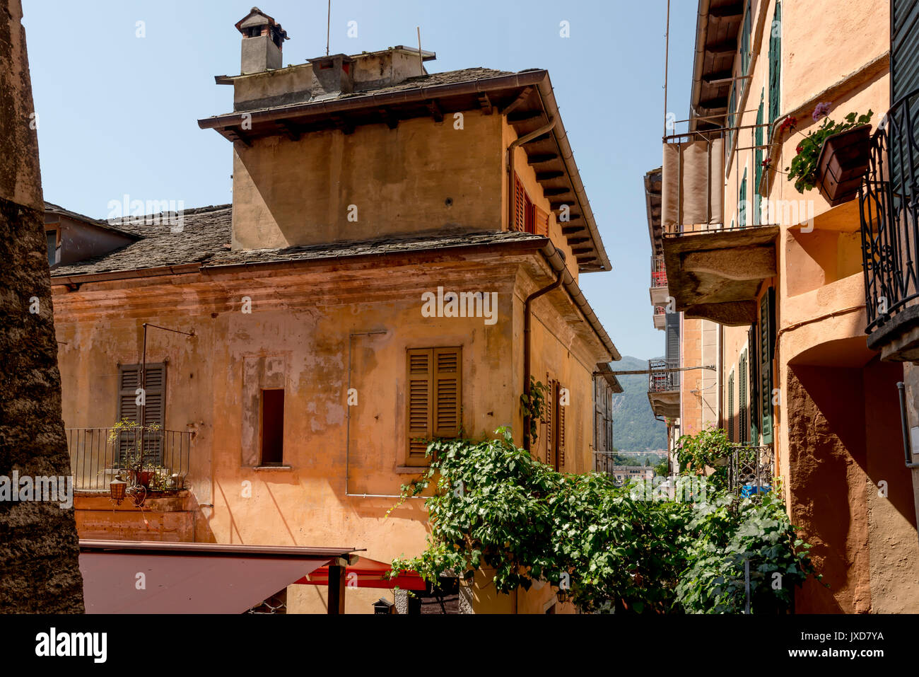 creepers and old buildings in historical touristic village, shot on ...